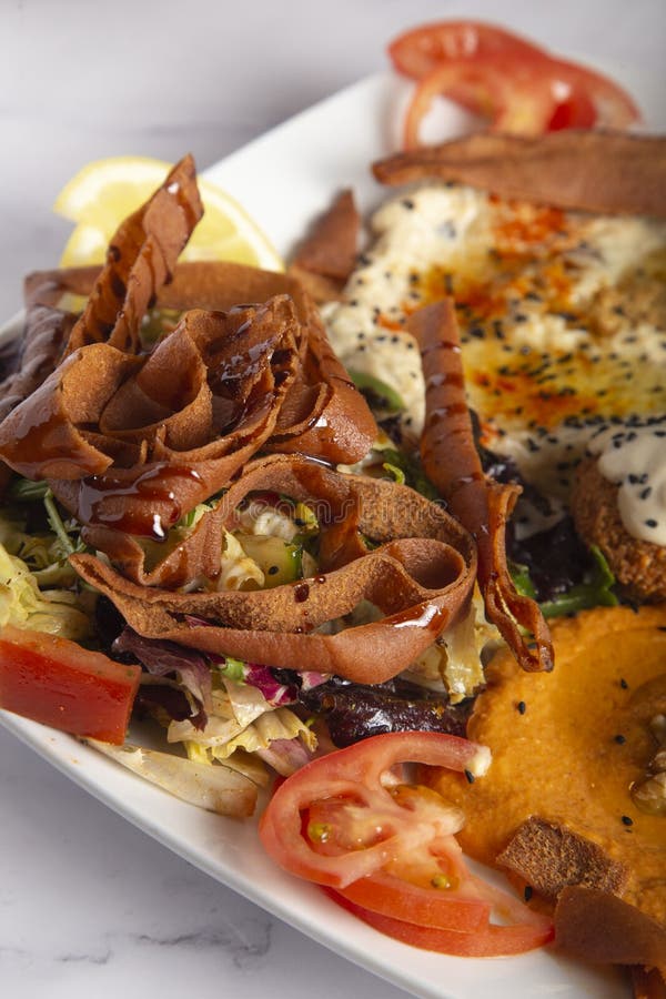 Lebanese Dish with Bulgur, Tomatoes and Onions on Dark Background ...