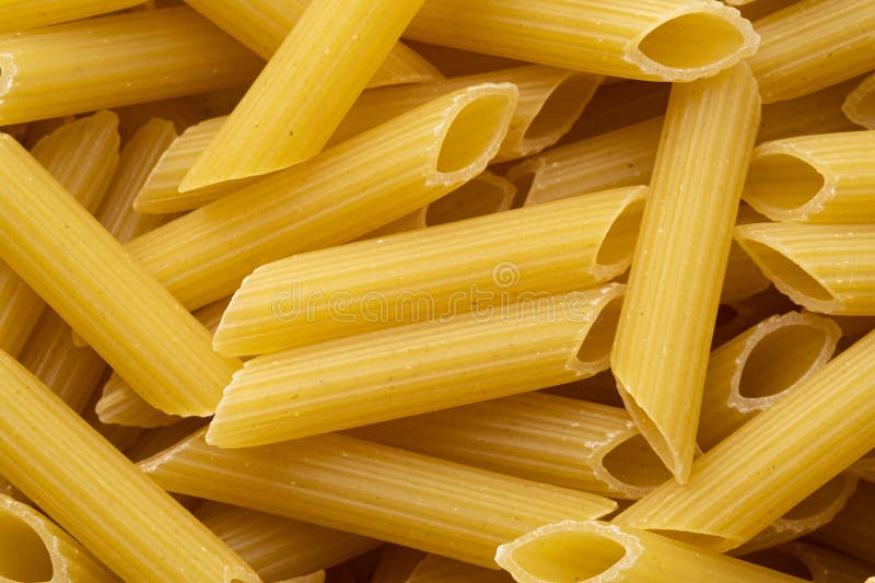Close Up Uncooked Penne Rigate Macaroni Stock Image - Image of heap ...