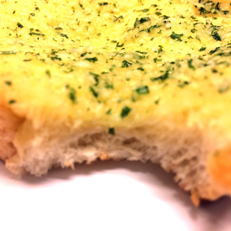 Close Up Unfinished Garlic Bread Stock Image - Image of coriander, meal ...