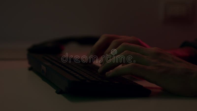 Close-up of an Unrecognizable Hacker Stretching His Hands and Starting ...