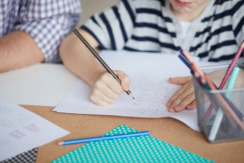 Solving Mathematical Tasks on Paper Stock Photo - Image of child, paper ...