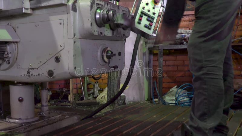 Close Up of Unrecognizable Machine Operator Turning Handle of Machine ...