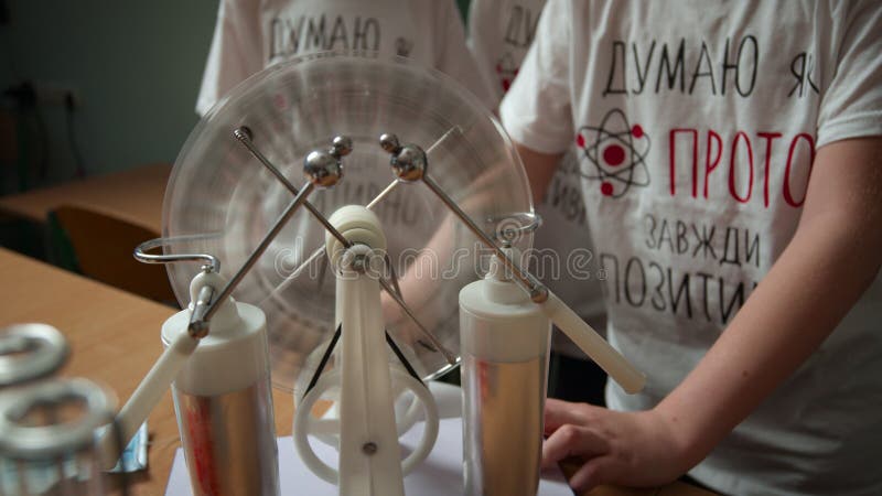 Students in Physics Class Spin Newton S Multicolored Disk. Stock Photo ...