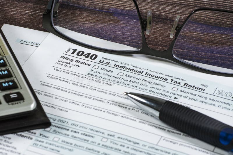 Close Up of Upper Left Corner of IRS Form 1040 with Eyeglasses ...