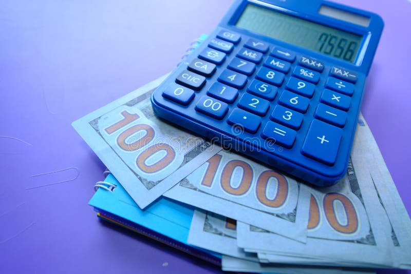 Dollar and Calculator on Table Stock Photo - Image of desk, work: 179649122