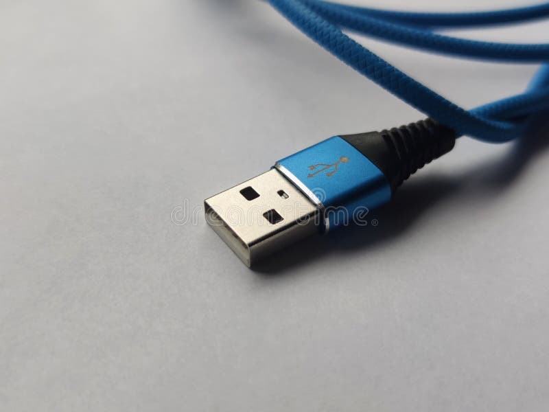 Close-up of a USB Cable on a Light Background. Blue USB Cable for ...