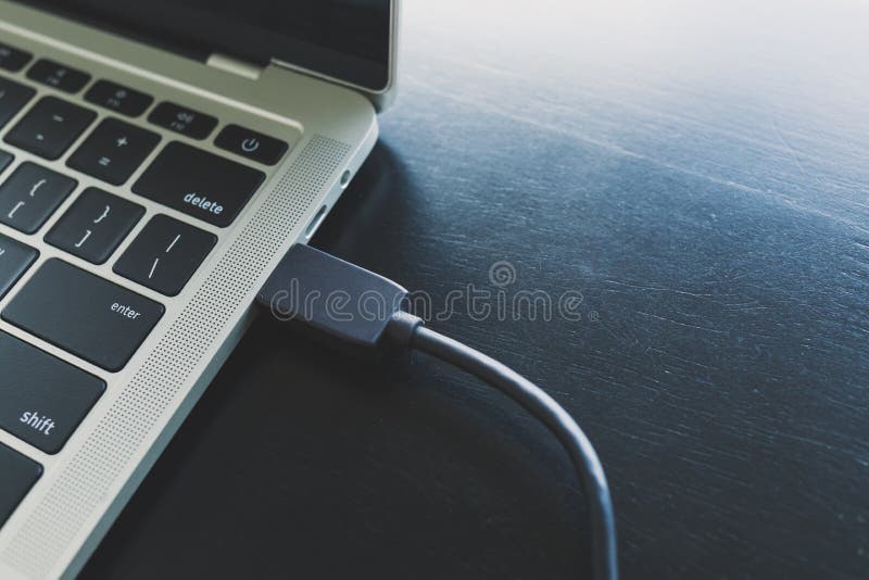 Close Up of USB Data Transfer from External Data into a Laptop Stock ...
