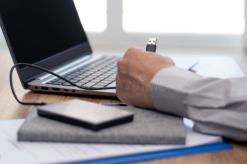 Close Up USB Plug in Hand a Man Use Cable with Hard Drive External ...
