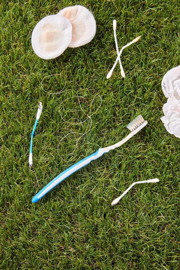 Close Up of Used Garbage on Grass Stock Image - Image of concept ...