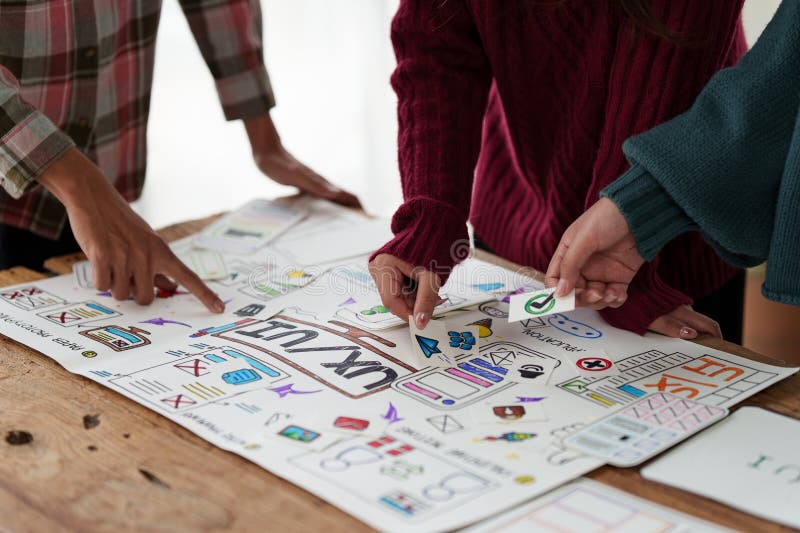 Close Up Ux Developer and Ui Designer Brainstorming Interface Wireframe ...