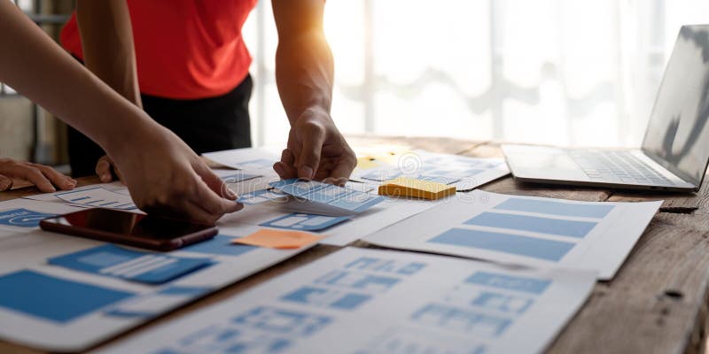 Close Up Ux Developer and Ui Designer Brainstorming about Mobile App ...