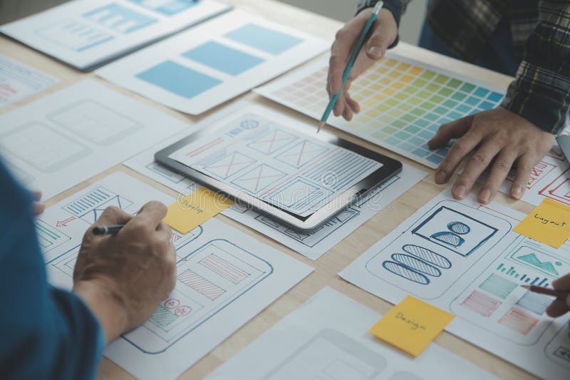 Close Up Ux Developer and Ui Designer Brainstorming about Mobile App ...