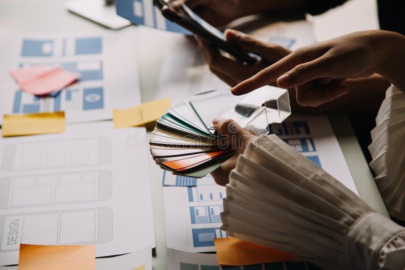 Close Up Ux Developer And Ui Designer Use Augmented Reality Brainstorming About Mobile App