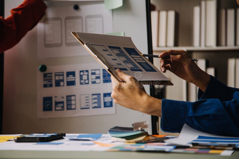 Close Up Ux Developer And Ui Designer Use Augmented Reality Brainstorming About Mobile App