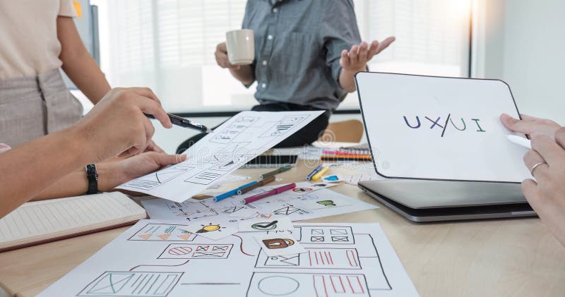 A Close-up of an Ux Ui Developer and an Ui Designer Working on a Mockup ...