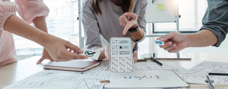 A Close-up of an Ux Ui Developer and an Ui Designer Working on a Mockup ...