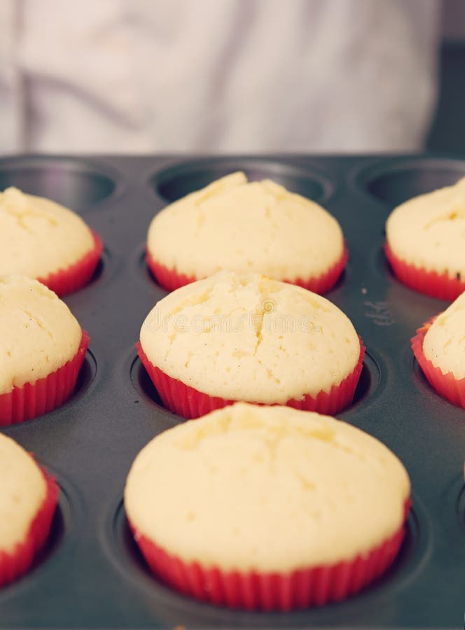 Close Up of Vanilla Cupcakes Cooling in a Tray Stock Photo - Image of ...