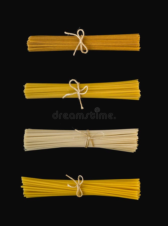 Variety of Spaghetti Tied with Jute String, Isolated on Black Surface ...