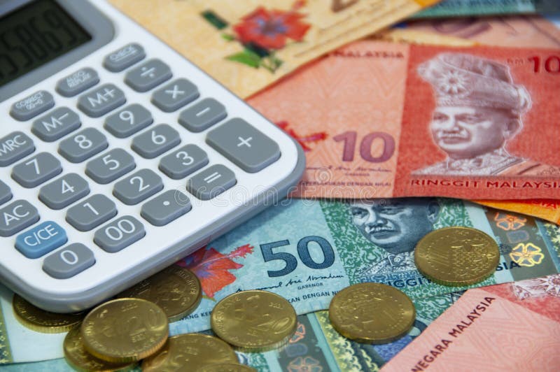 Close Up of Various Malaysia Ringgit Currency and Coins with Calculator ...