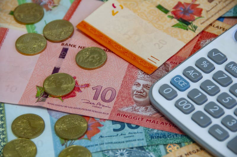 Close Up of Various Malaysia Ringgit Currency and Coins with Calculator ...