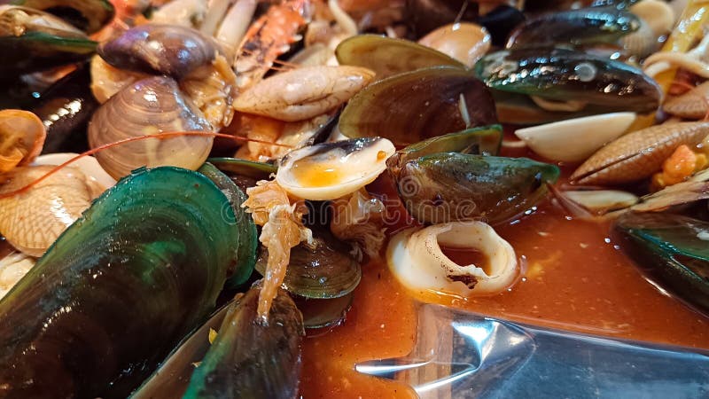 Close Up of Various Seafood Dishes with Crab and Shells Stock Photo ...