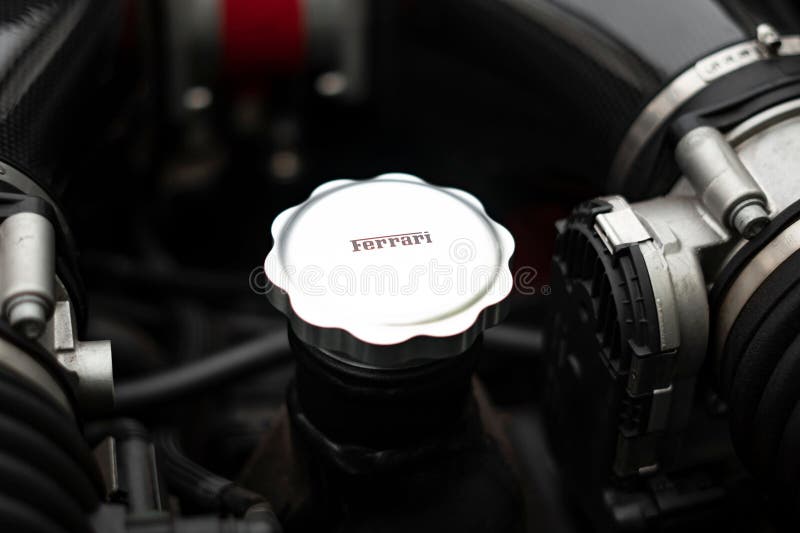 Close Up of a Vehicle Engine with a "Ferrari" Logo Emblem Visible ...