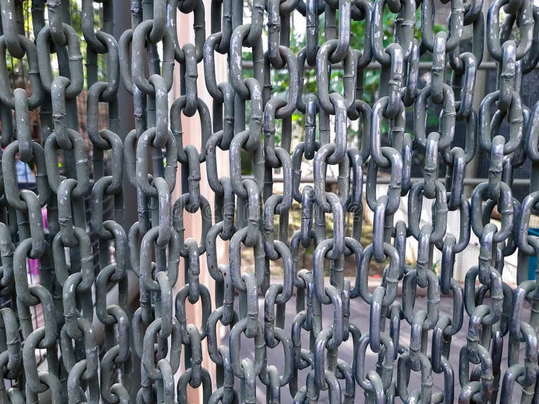 Close-Up of Vertical Iron Chains Hanging in a Row Stock Photo - Image ...