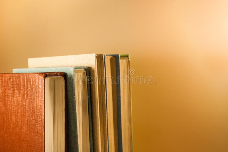 Close-up Vertical Stack of Books on Light Background with Copy Space ...