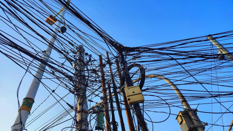 Close-up of Very Messy and Messy Overhead Electrical Wires on an Old ...