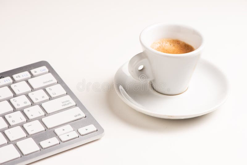 A Close Up View of Arranged Computer Keyboard,cup of Coffee on White ...