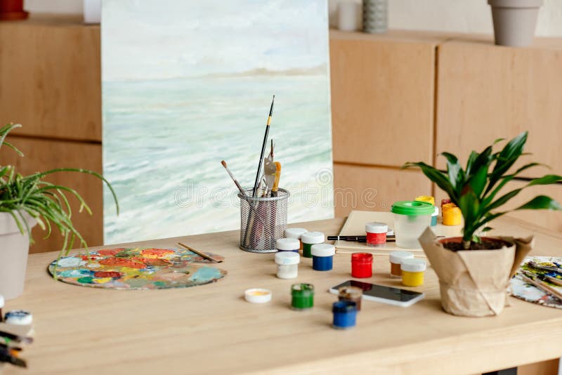 Close-up View of Artist Workplace with Paints Brushes and Palette Stock ...