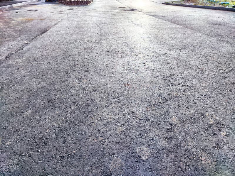 A Close Up View of an Asphalt Road Surface, Showing Its Rough Texture ...