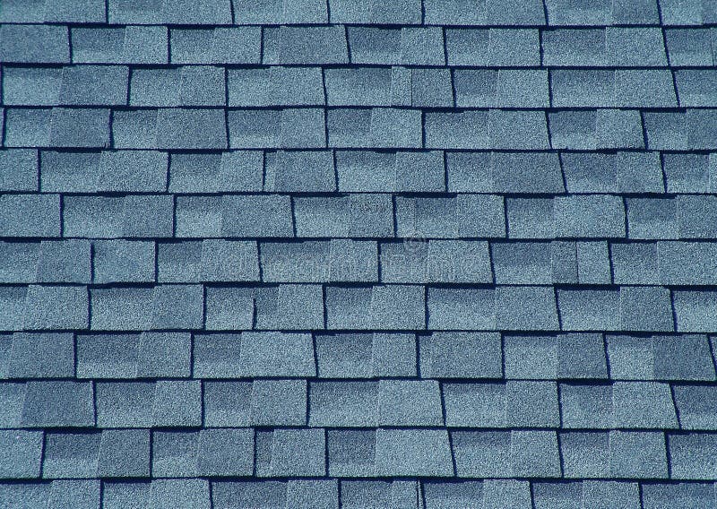 Modern Asphalt Shingles Covering a Roof Creating a Textured Pattern ...
