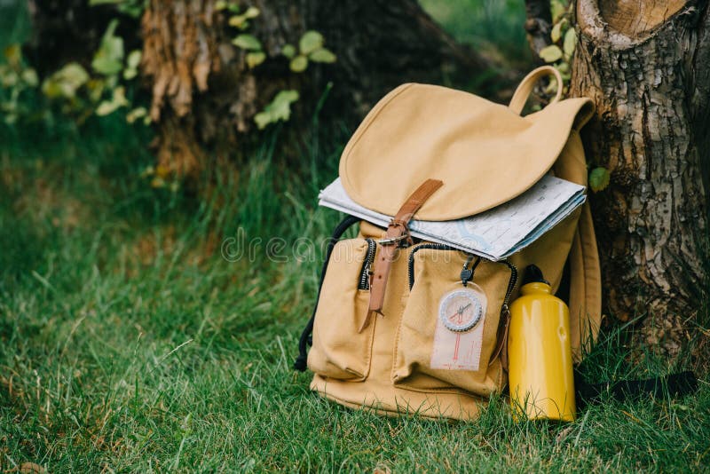 Close-up View of Backpack with Compass and Map Stock Photo - Image of ...