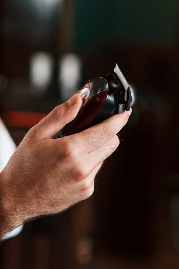 Close Up View of Barber Hand that is Holding Hair Clipper Stock Image ...