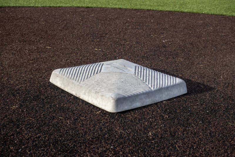 Close Up View of a Base on a Clean Baseball Field on a Bright, Sunny ...