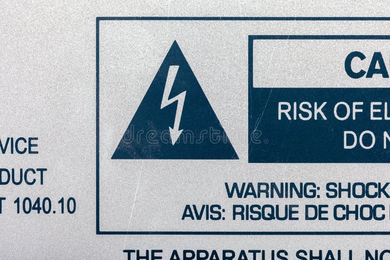 A Close-up View of a Bilingual Warning Label Detailing the Risk of ...