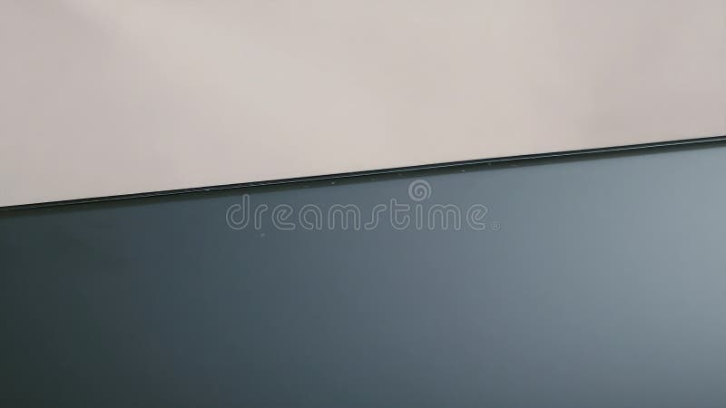 Close-up View of a Black and Beige Surface Meeting at a Clean Edge in a ...