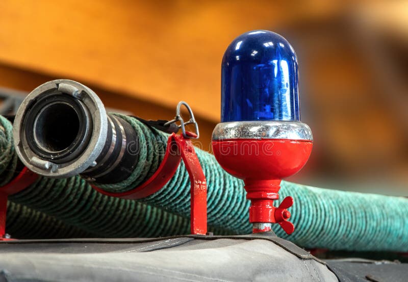 Close-up View of a Blue Light and Fire Hose on the Roof of an Antique ...