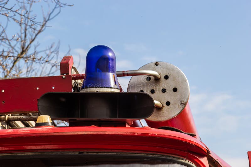 Close-up View of a Blue Light and Fire Hose on the Roof of an Antique ...