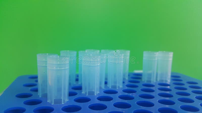Close Up View of Blue Micro Litre Tips in Microtip Box with Empty Holes ...