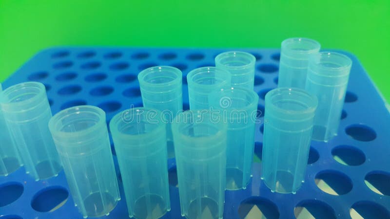 Close Up View of Blue Micro Litre Tips in Microtip Box with Empty Holes ...
