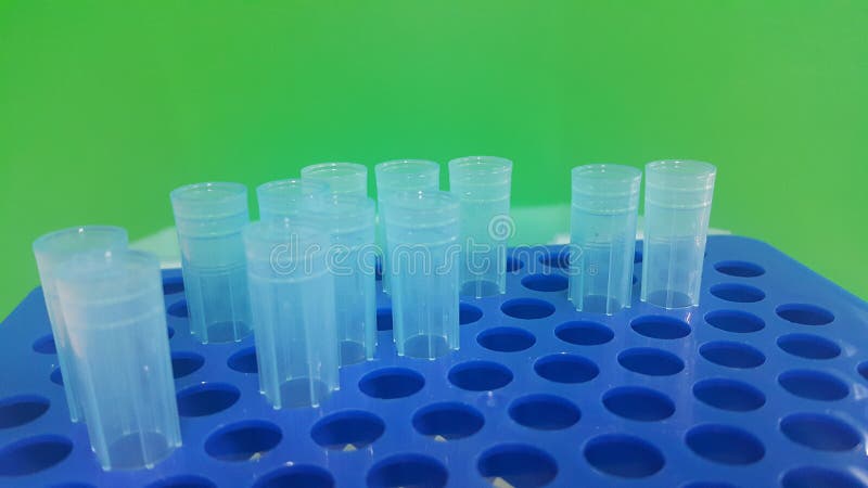 Close Up View of Blue Micro Litre Tips in Microtip Box with Empty Holes ...