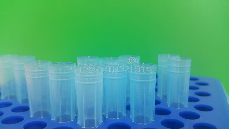 Close Up View of Blue Micro Litre Tips in Microtip Box with Empty Holes ...