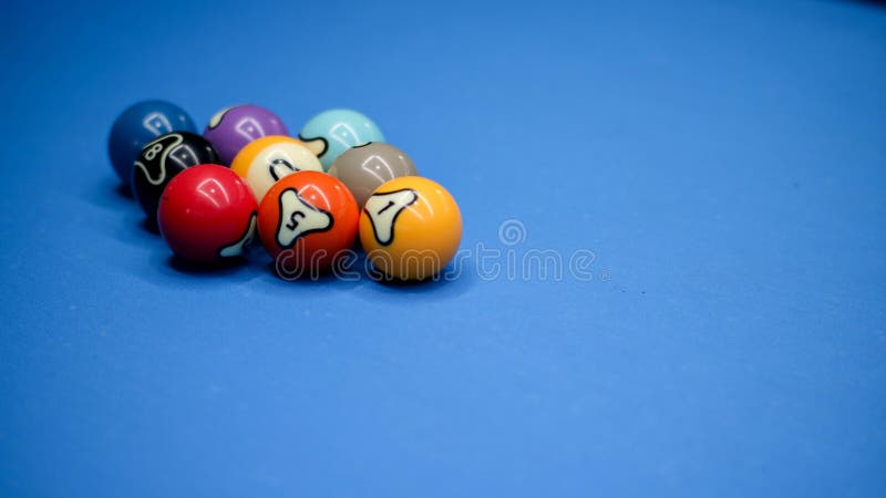 A Close-up View of a Blue Pool Table with the Billiard Balls Racked Up ...