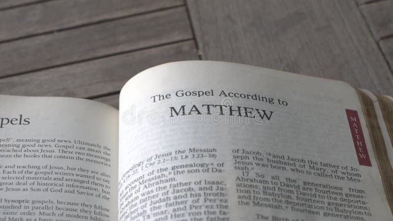 Close Up View on the Book of Matthew of the Bible. Stock Video - Video ...