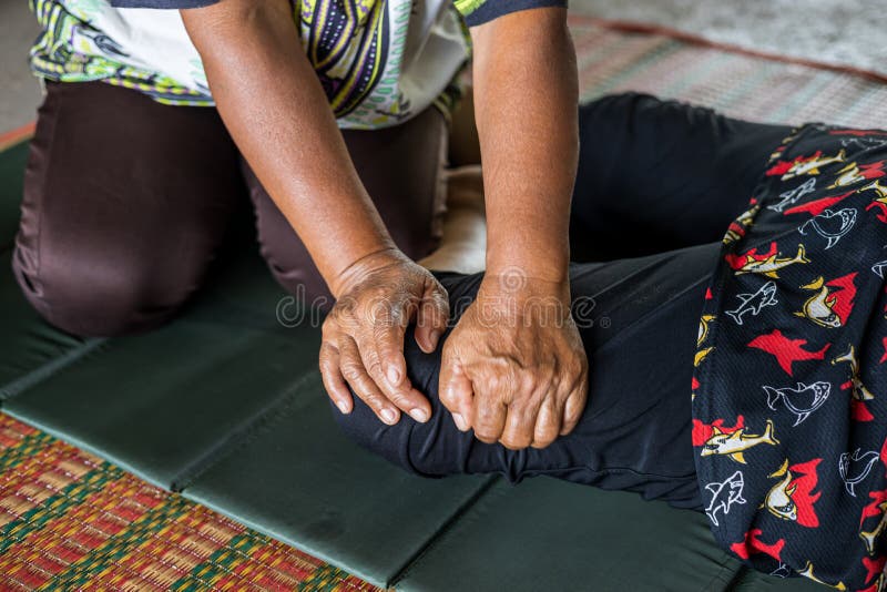 Close Up View Of Both Hands Of An Elderly Thai Female Masseuse