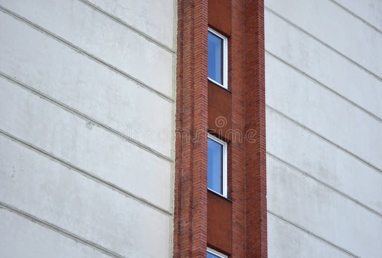 A Close-up View of Building Architecture Featuring Narrow Vertical ...