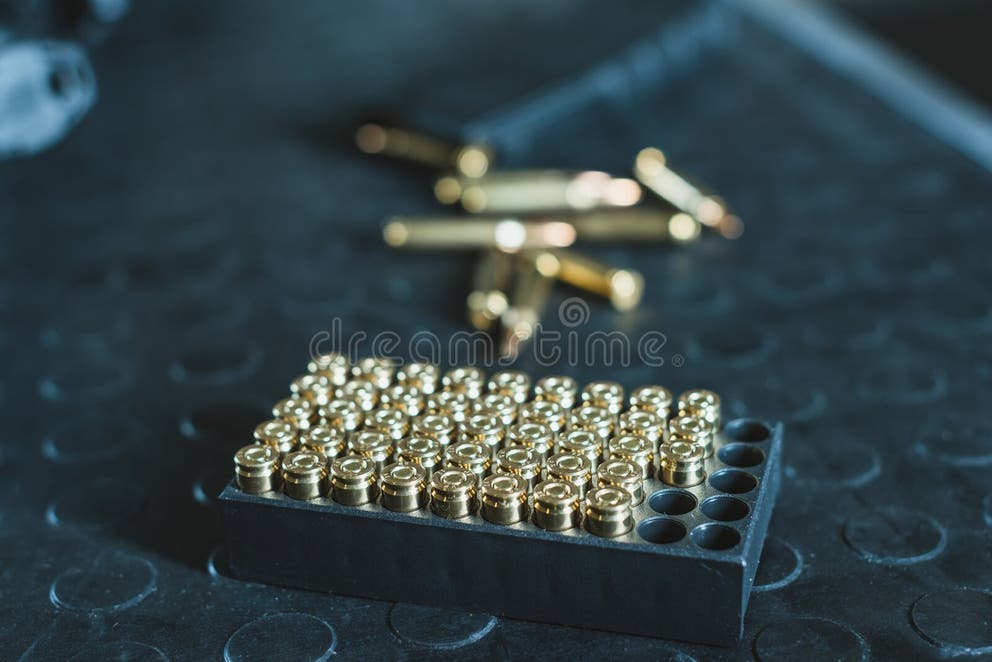 Close Up View of Bullets in Stand on Table Stock Image - Image of ...