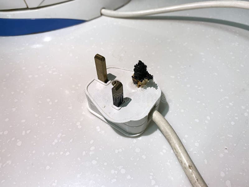 Close Up View of a Burnt Electrical Plug Point after a System Overload ...